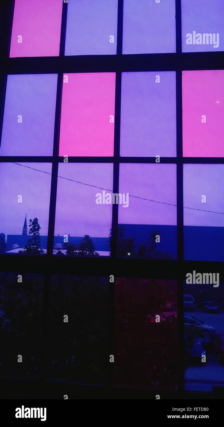 Tiled Window With Purple Glass Stock Photo - Alamy