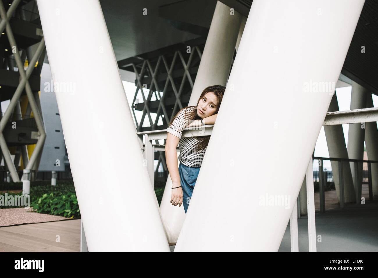 Leaning at railing hi-res stock photography and images - Alamy