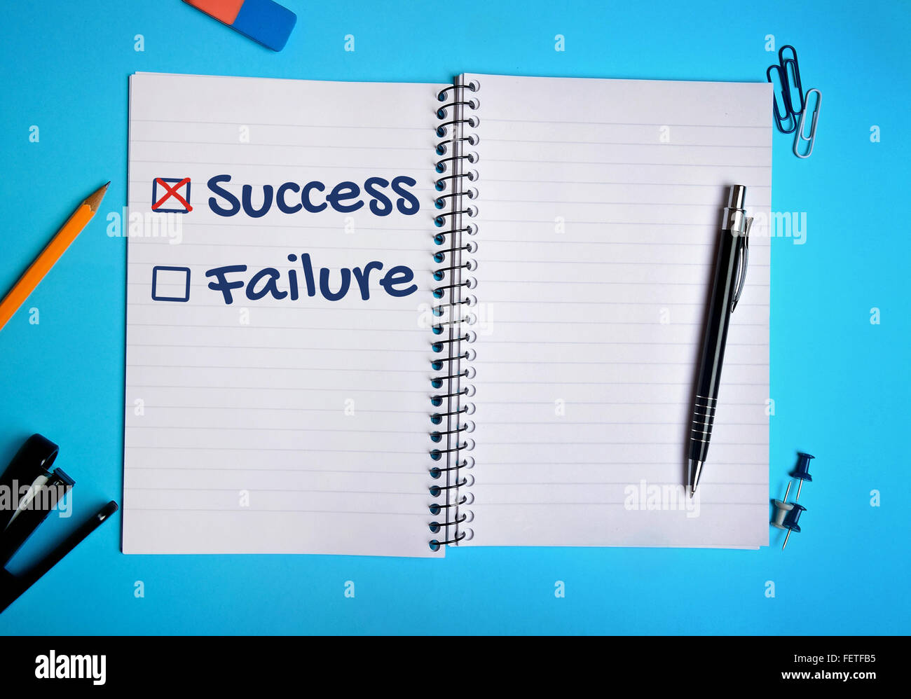 Success box checked on notebook page Stock Photo - Alamy