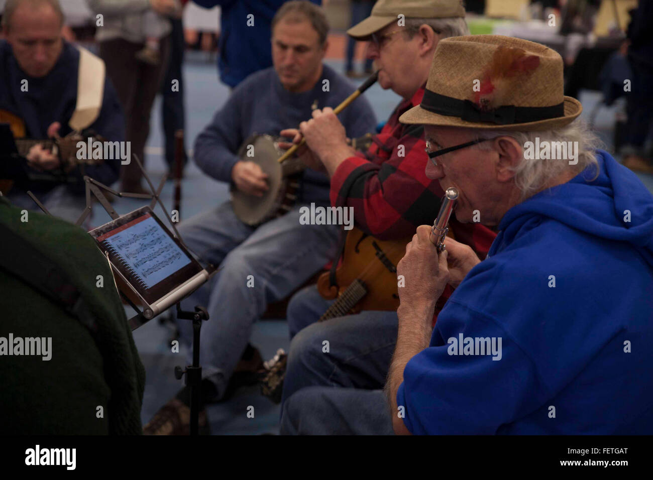 Local musicians playing at an indoor market at Williams College in ...