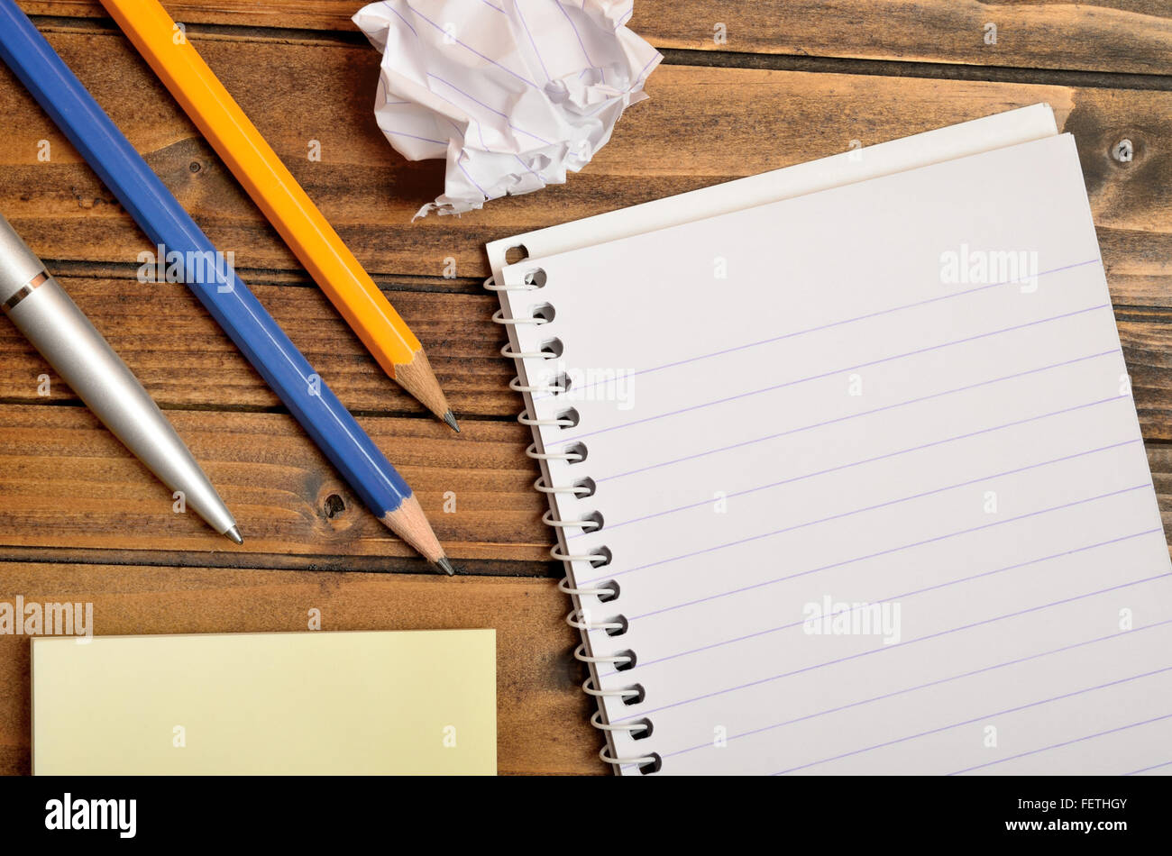 Empty notepad with pencil on wooden table Stock Photo - Alamy