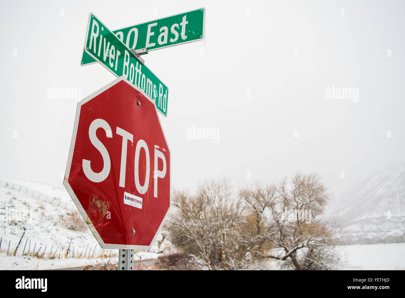 Stop sign snow trees hi-res stock photography and images - Alamy