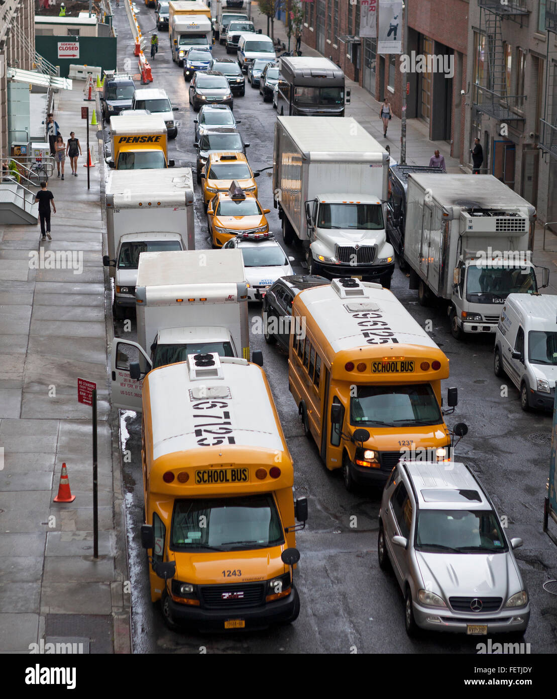 Traffic is congested on a side street in Manhattan in New York City ...