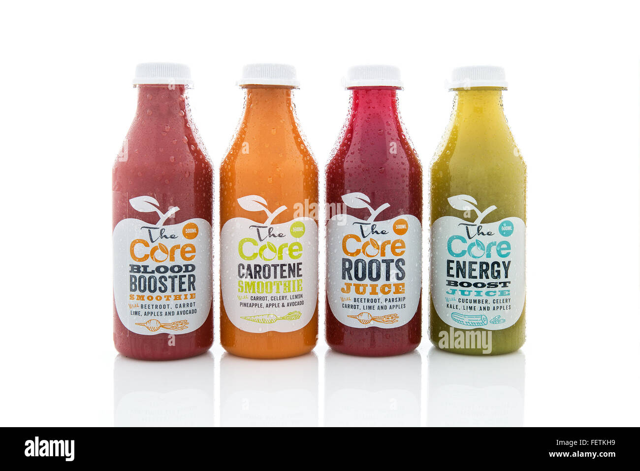 The Core Juice Bottles on a white background Stock Photo - Alamy