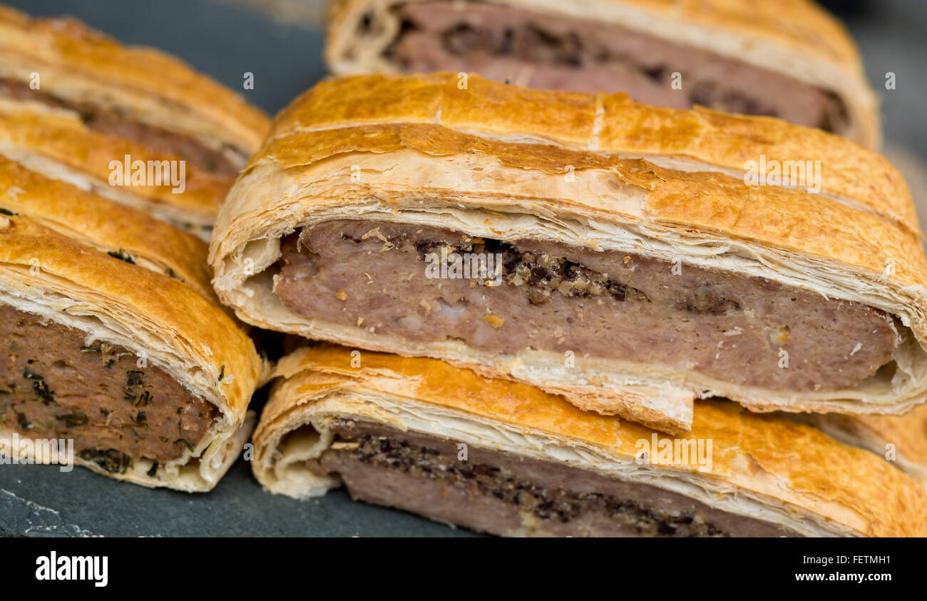 A selection of fresh baked pork sliced pastries Stock Photo - Alamy