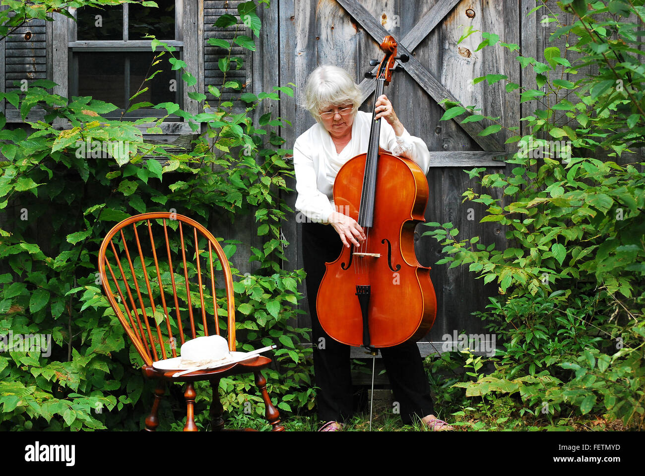 Female cellist with instrument Stock Photo - Alamy