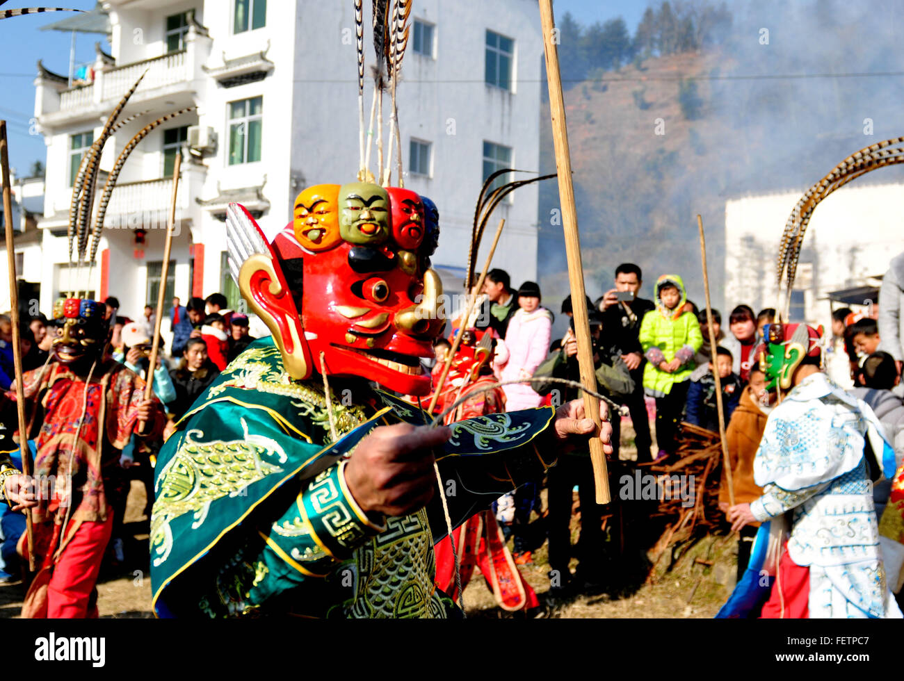 Wuyuan. 9th Feb, 2016. Folk artists perform Nuo dance in Wuyuan County ...