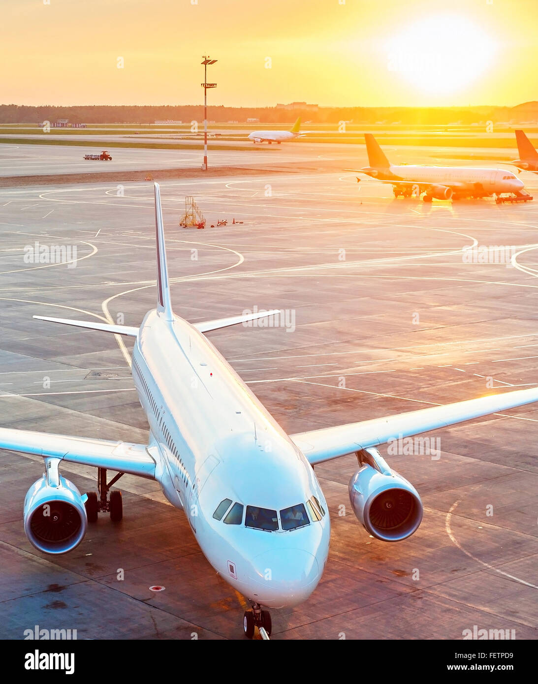 Airplanes in the airport at sunset. View from above Stock Photo - Alamy