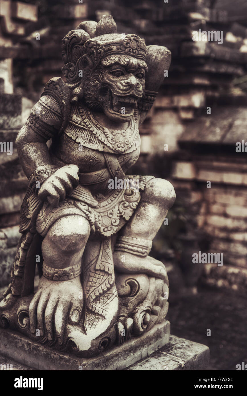 The old stone statue. Indonesia, Bali Stock Photo - Alamy