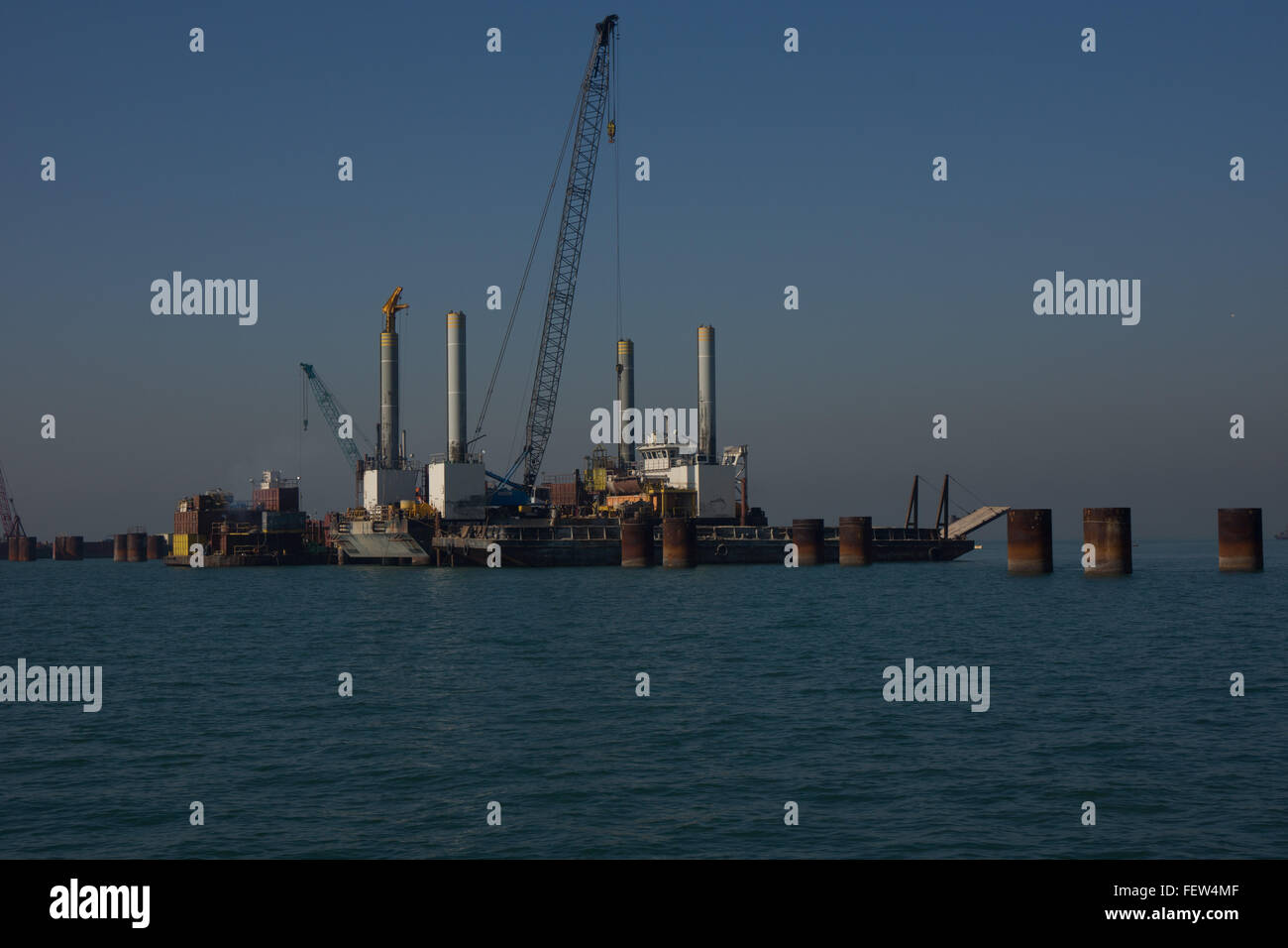 Bridge building at sea Stock Photo - Alamy