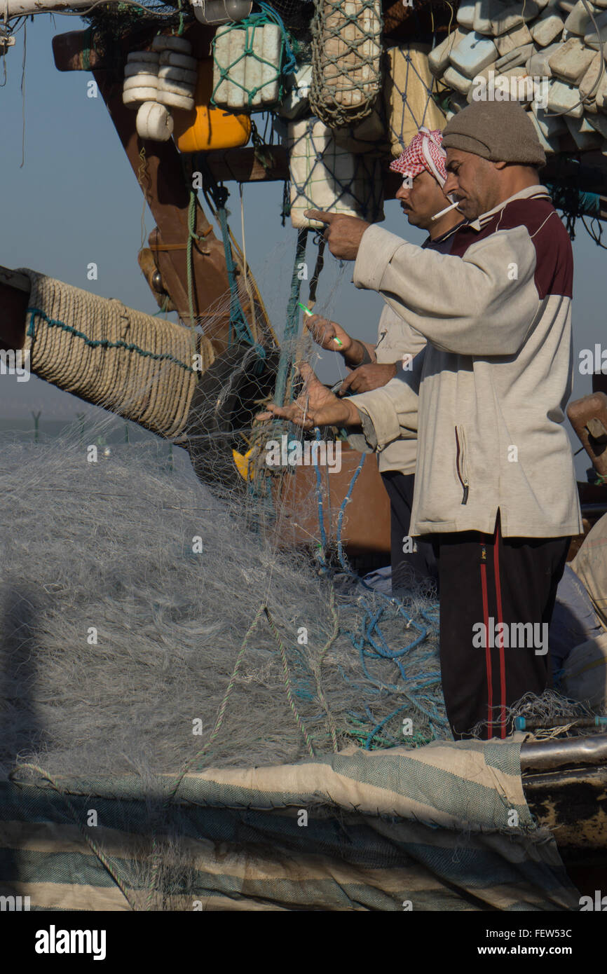 Fishermen and nets hi-res stock photography and images - Alamy