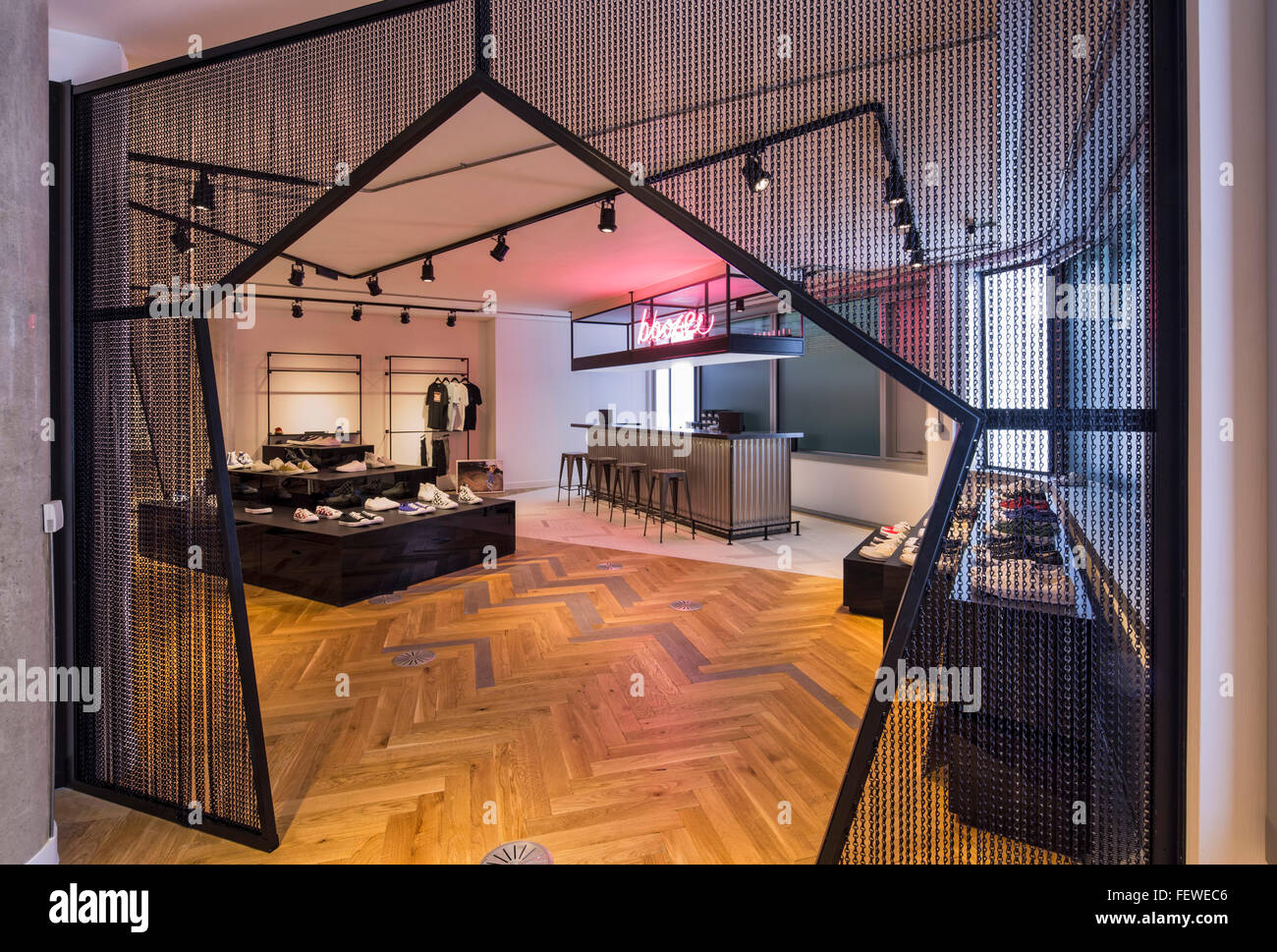 Entrance to showroom with chain mesh partition. Converse Showroom ...
