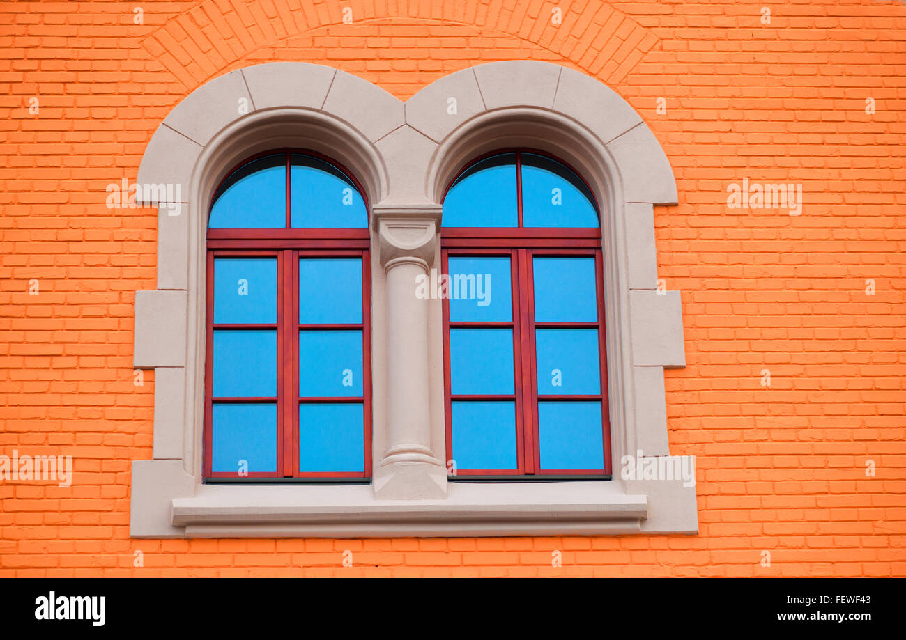 orange wall and green wood windows Stock Photo - Alamy