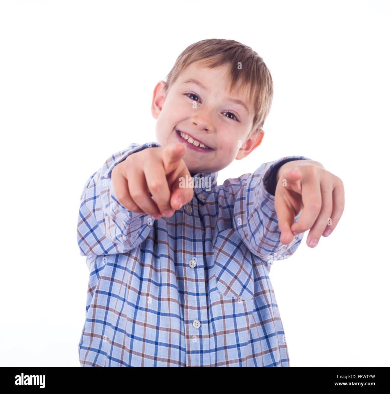Happy boy pointing with his finger Stock Photo - Alamy
