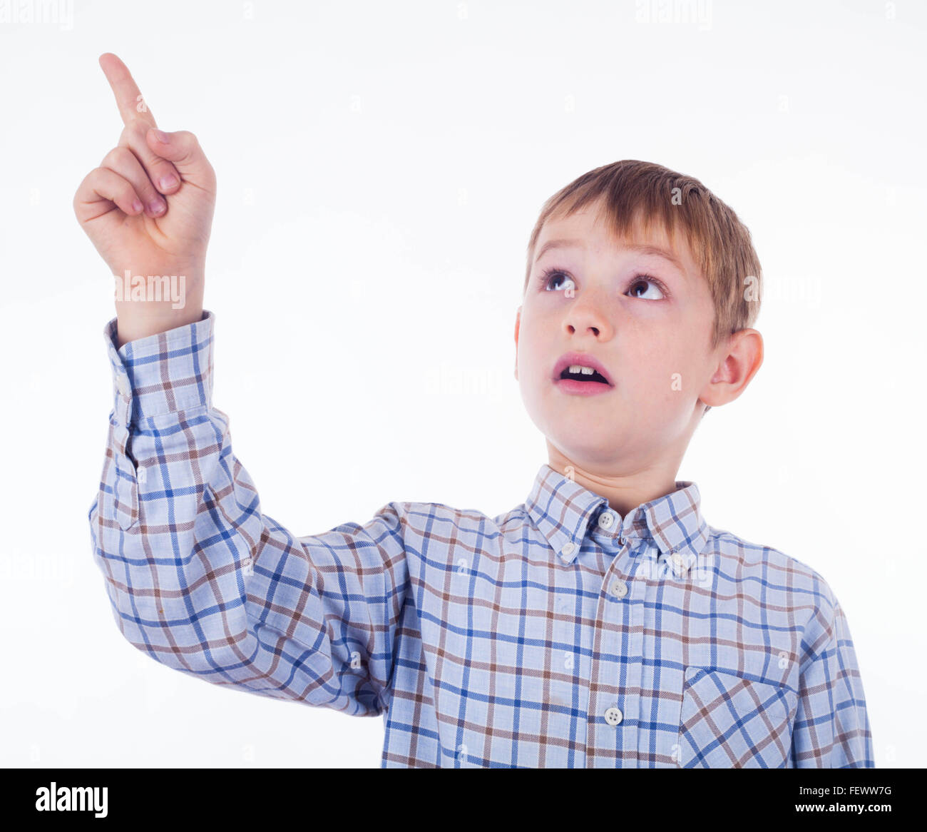 Happy boy pointing with his finger Stock Photo - Alamy