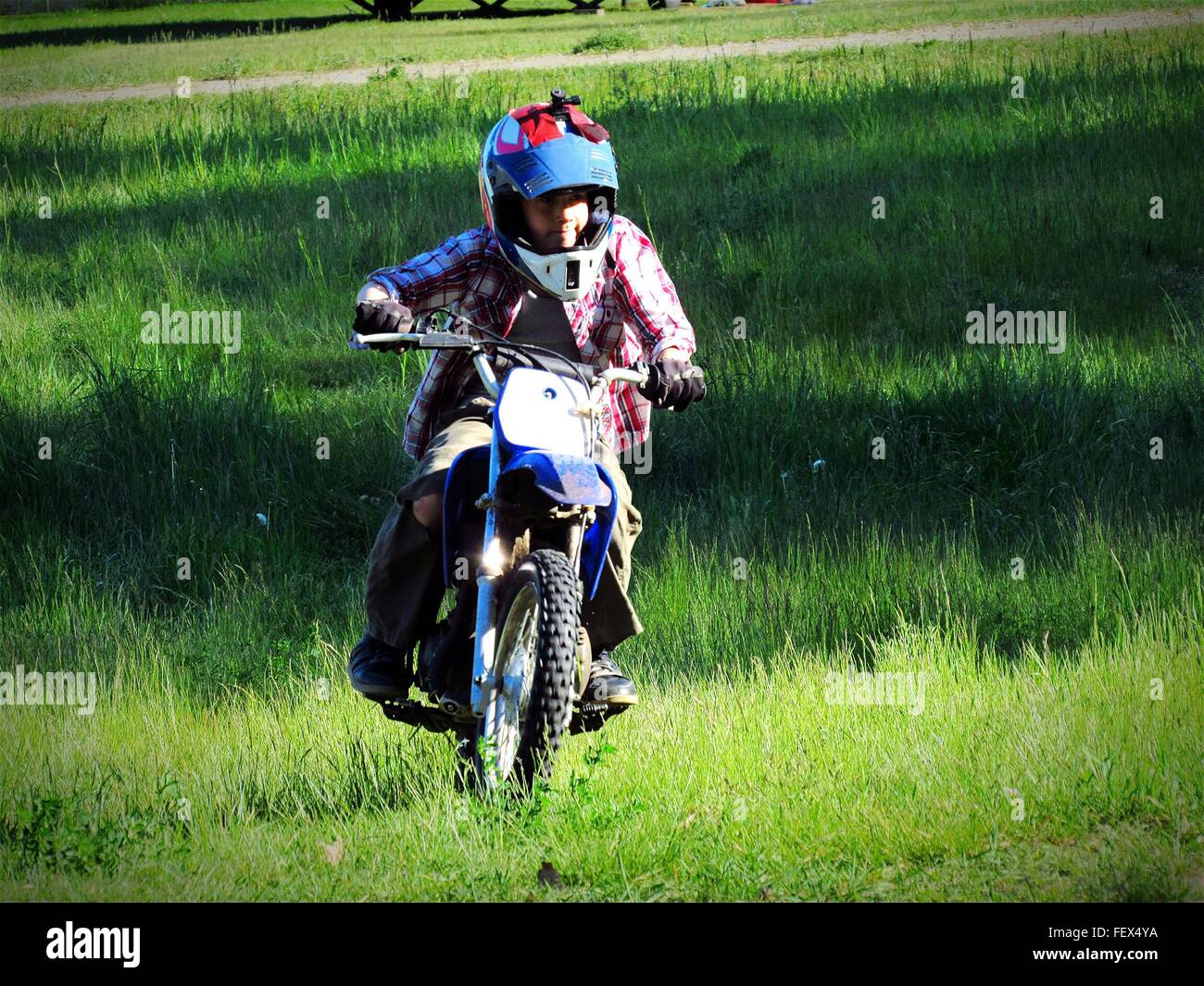 Boy on motorcycle hi-res stock photography and images - Alamy