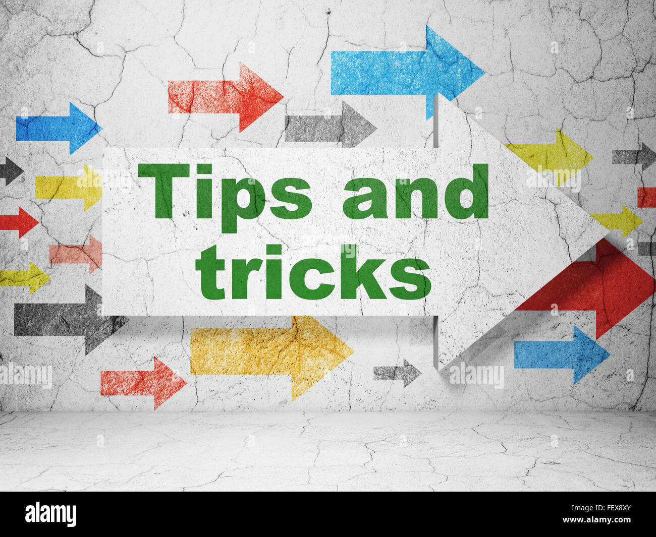 Studying concept: arrow with Tips And Tricks on grunge wall background ...