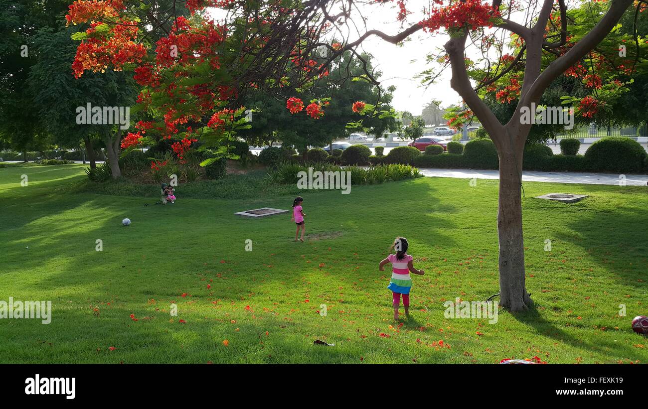 Two girls playing in the park hi-res stock photography and images - Alamy