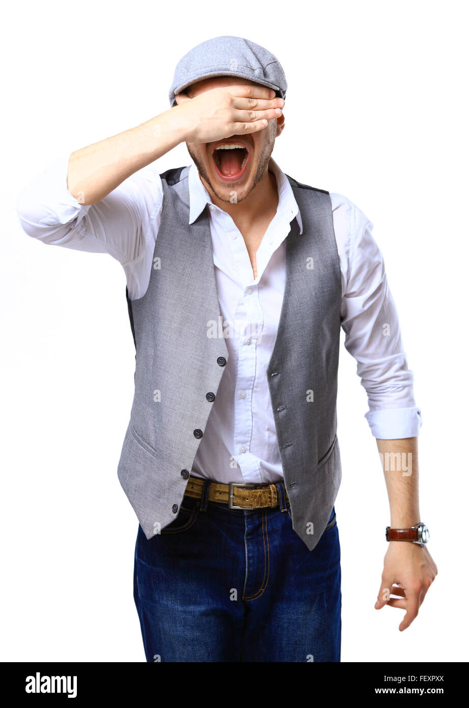 Portrait of young man with shocked facial expression, isolated over ...