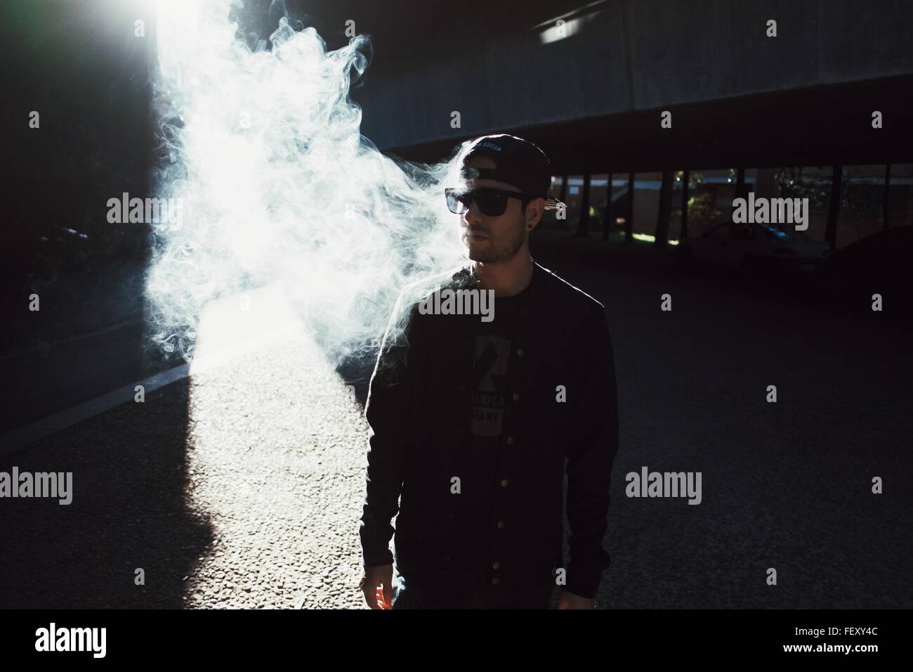 Smoking on street hi-res stock photography and images - Alamy