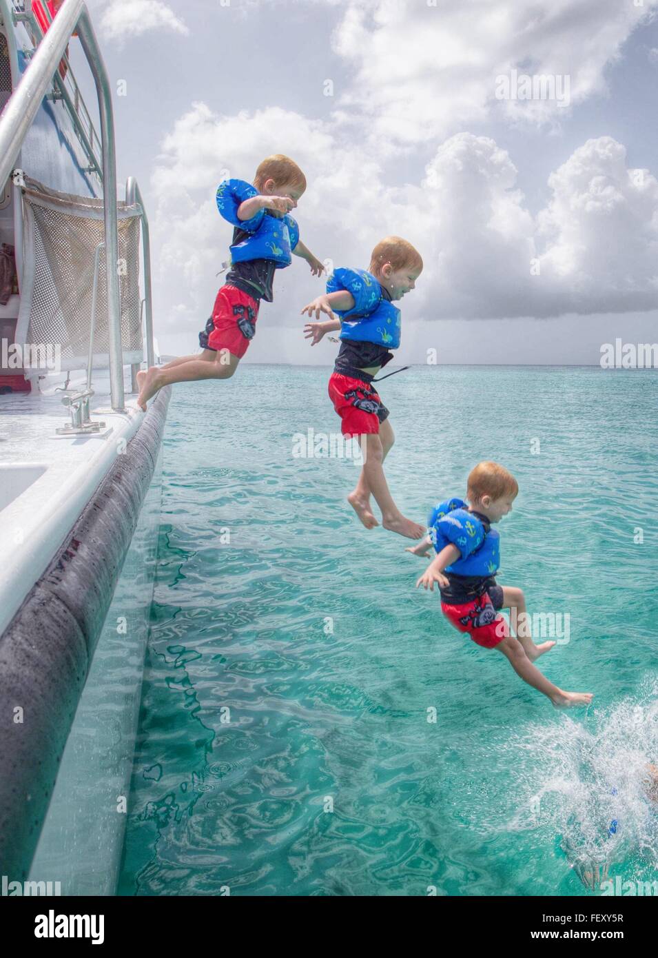 Boy falling over in water hi-res stock photography and images - Alamy