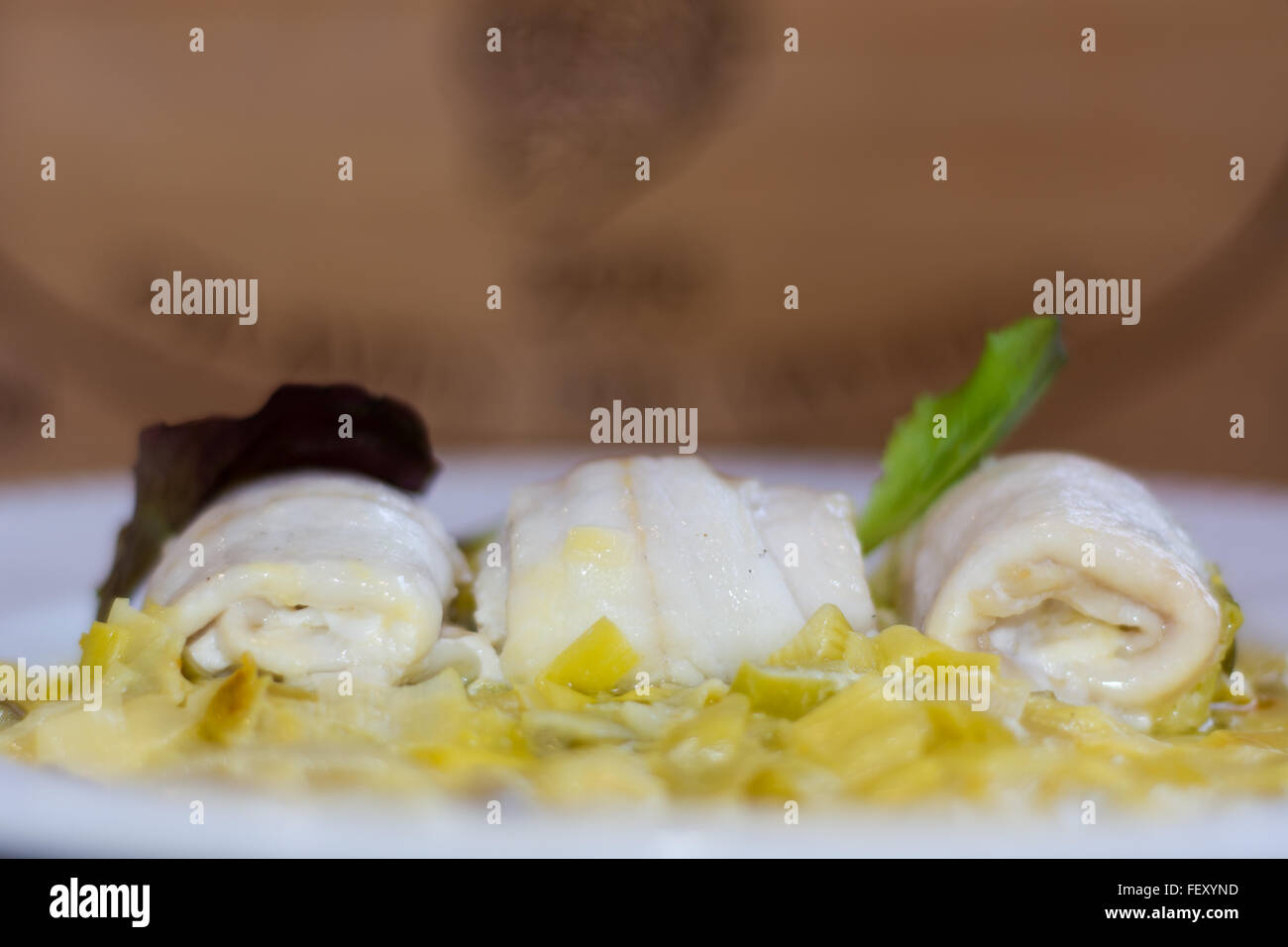 Lemon sole with leek saffron fondue. Sole Fillet with leek & saffron ...