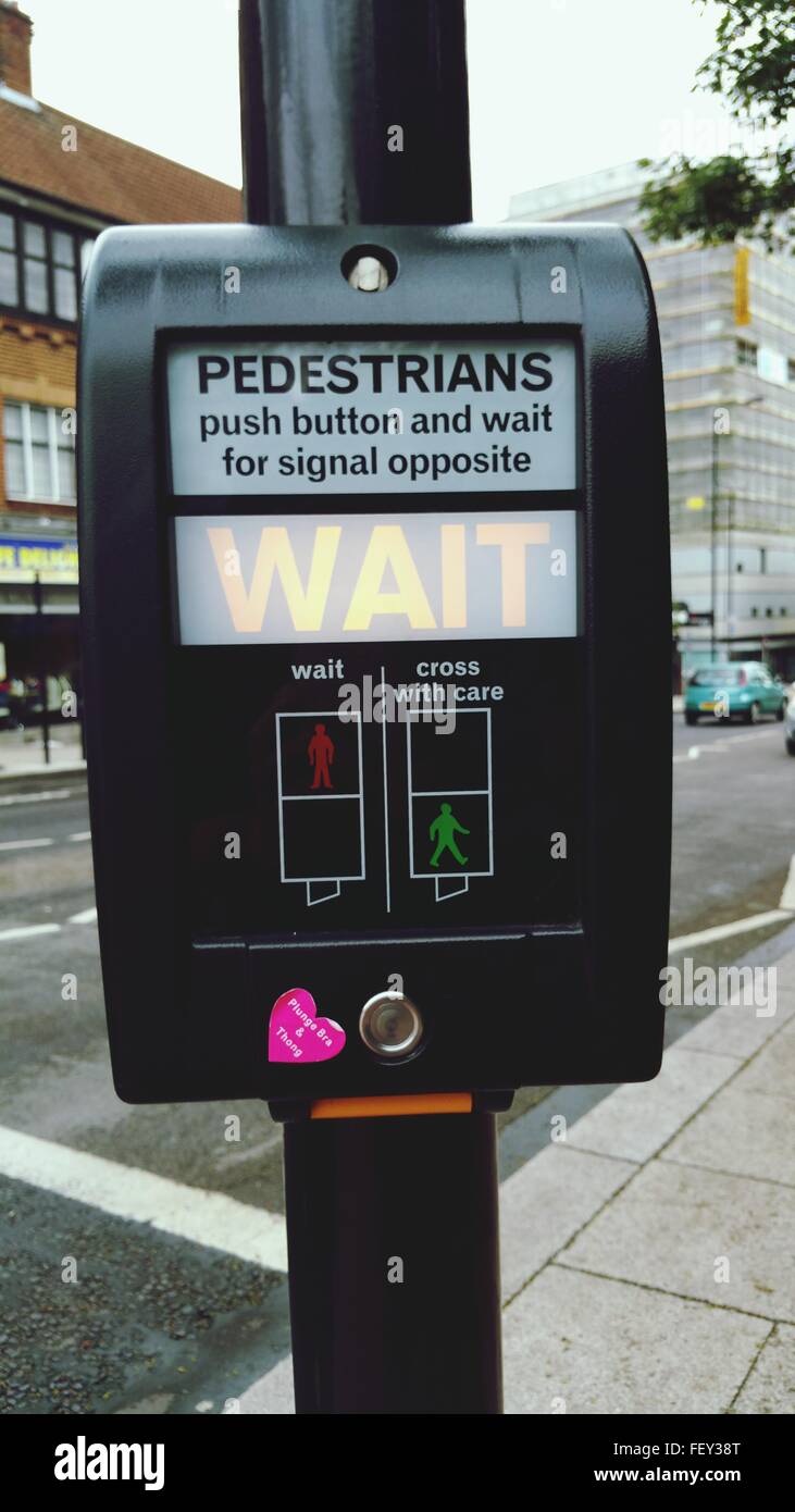 Pedestrian crossing wait sign hi-res stock photography and images - Alamy