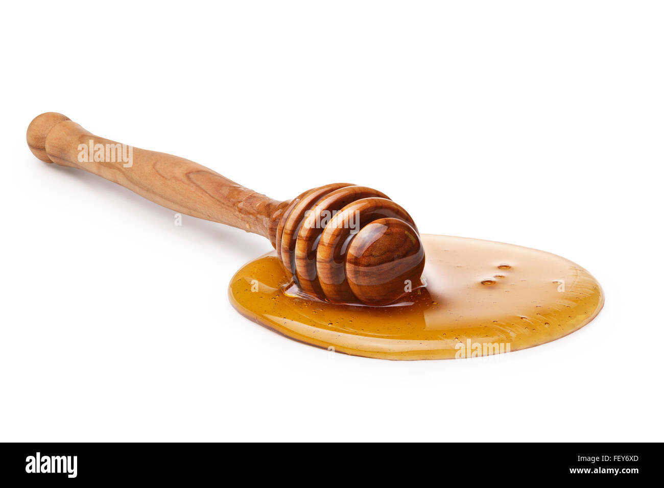 Wooden honey dipper with honey. Infinite depth of field,clipping paths ...