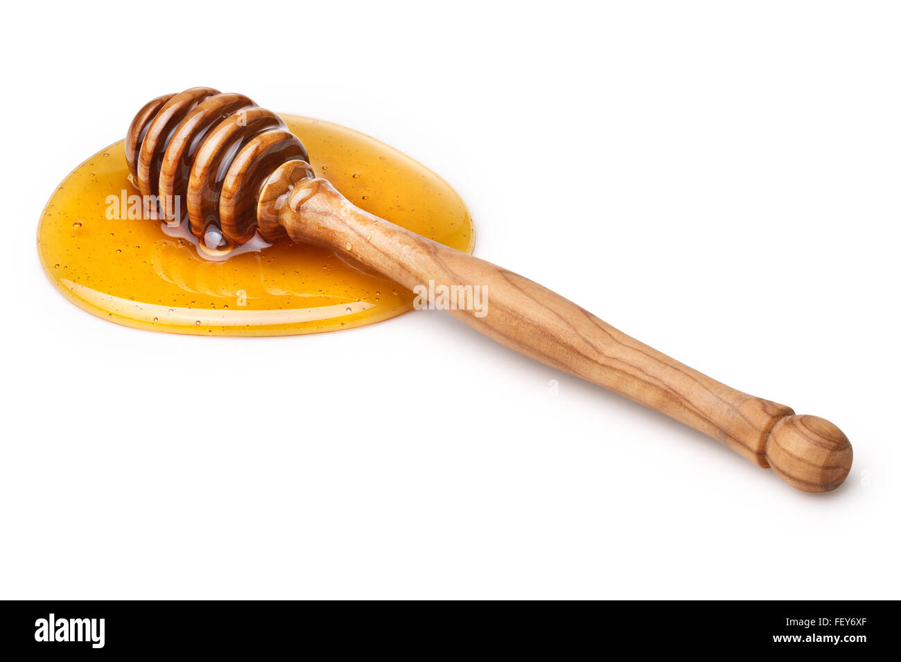 Wooden honey dipper with honey. Infinite depth of field,clipping paths ...