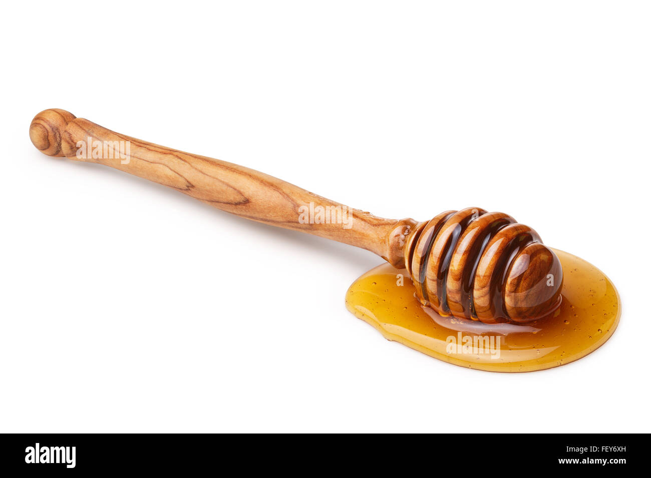 Wooden honey dipper with honey. Infinite depth of field,clipping paths ...