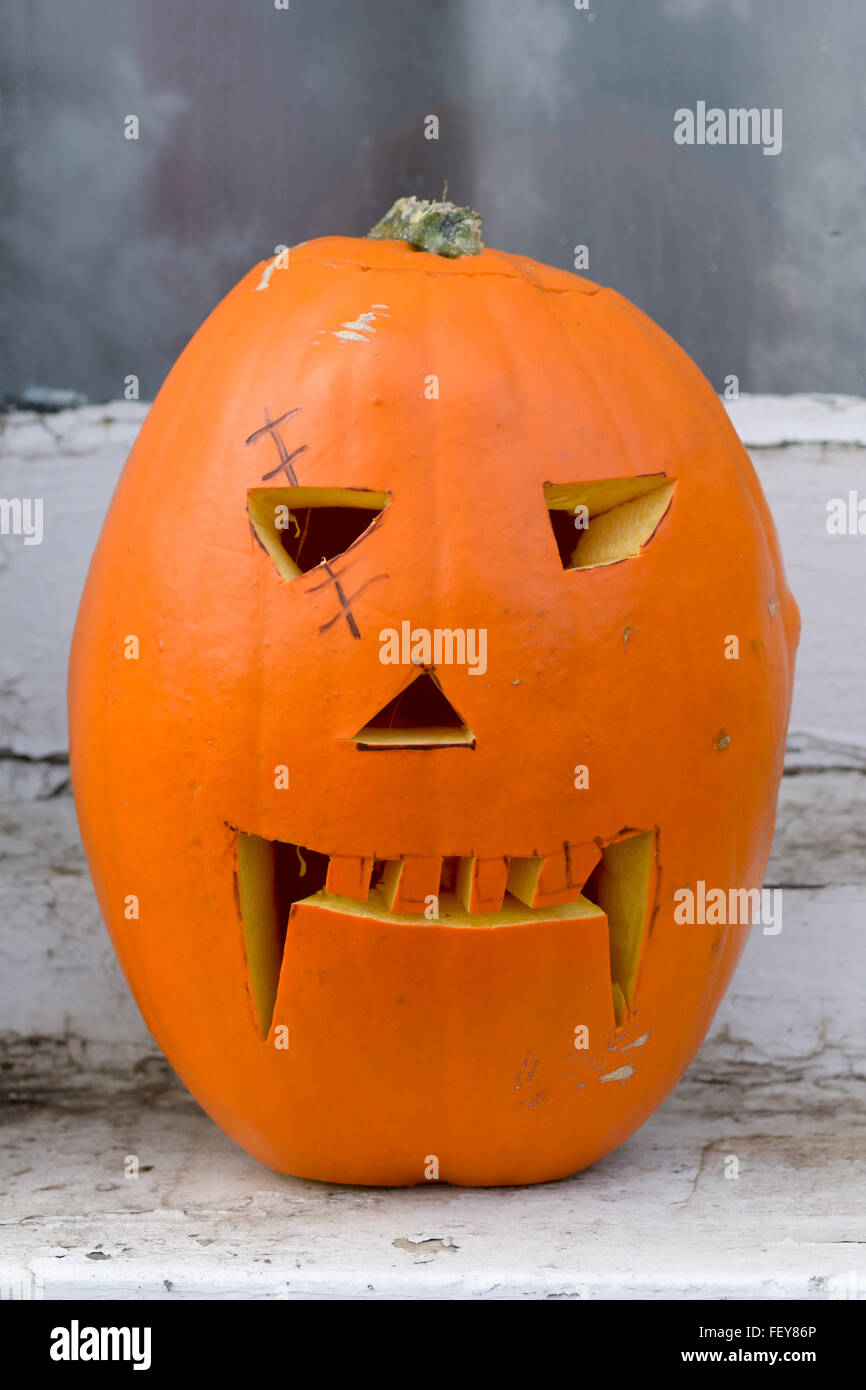Face carved into pumpkin for Halloween Stock Photo - Alamy