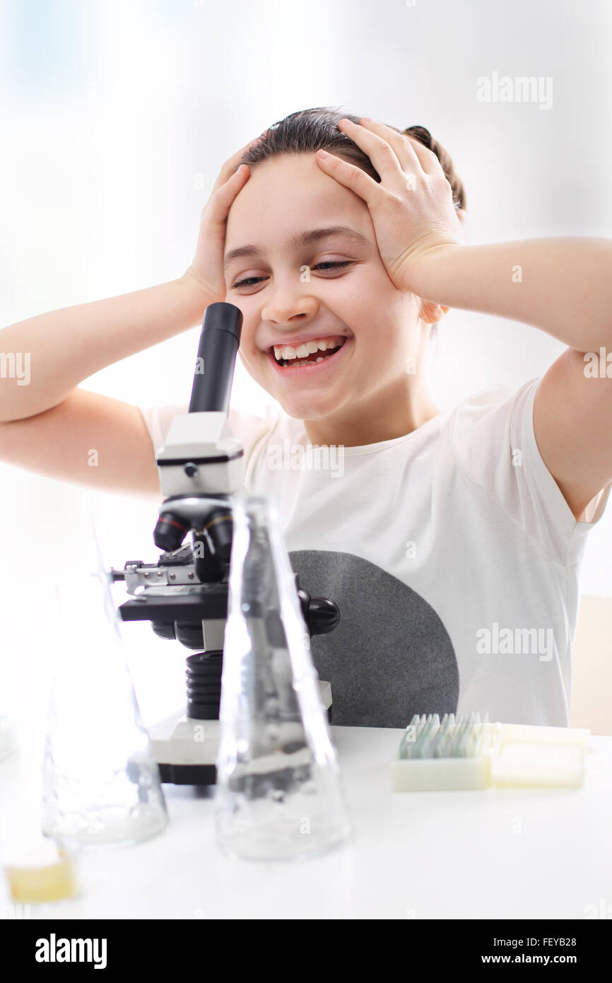 Ecology, nature, wildlife, the girl with a microscope Stock Photo - Alamy
