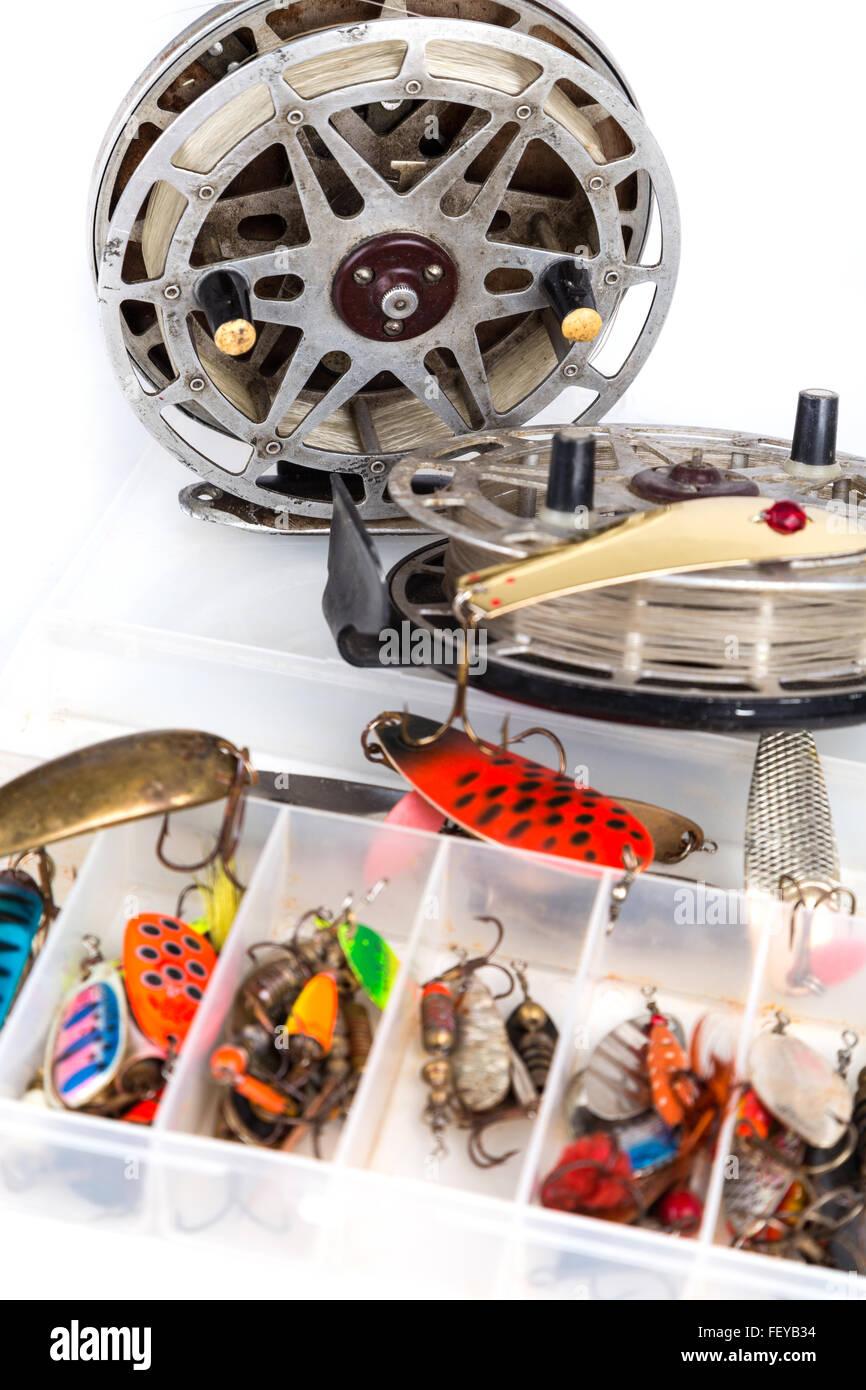 fishing lure in storage box and lading reels with line Stock Photo - Alamy