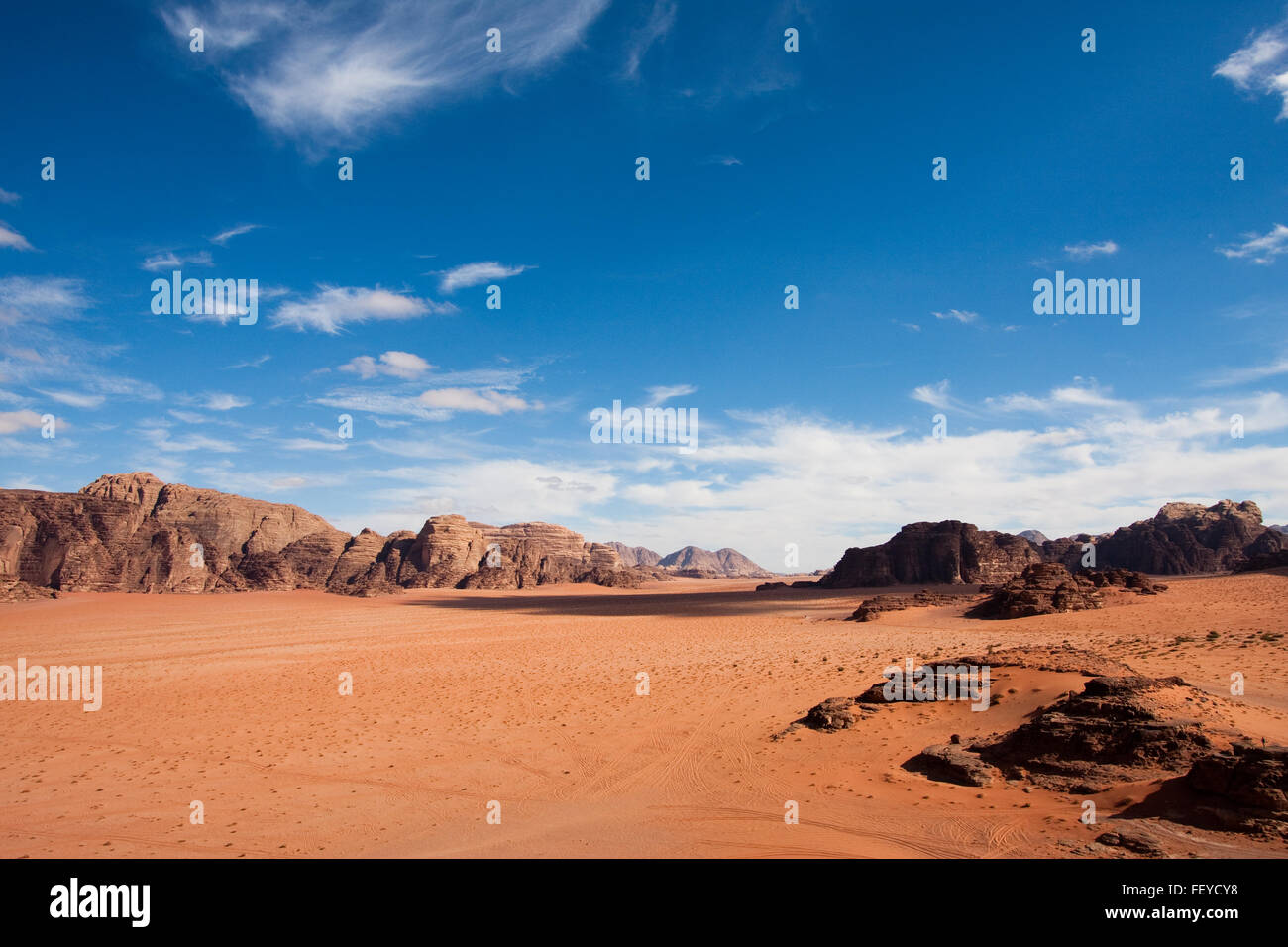 Wide view of mountains and desert in Wadi Rum, Jordan Stock Photo - Alamy