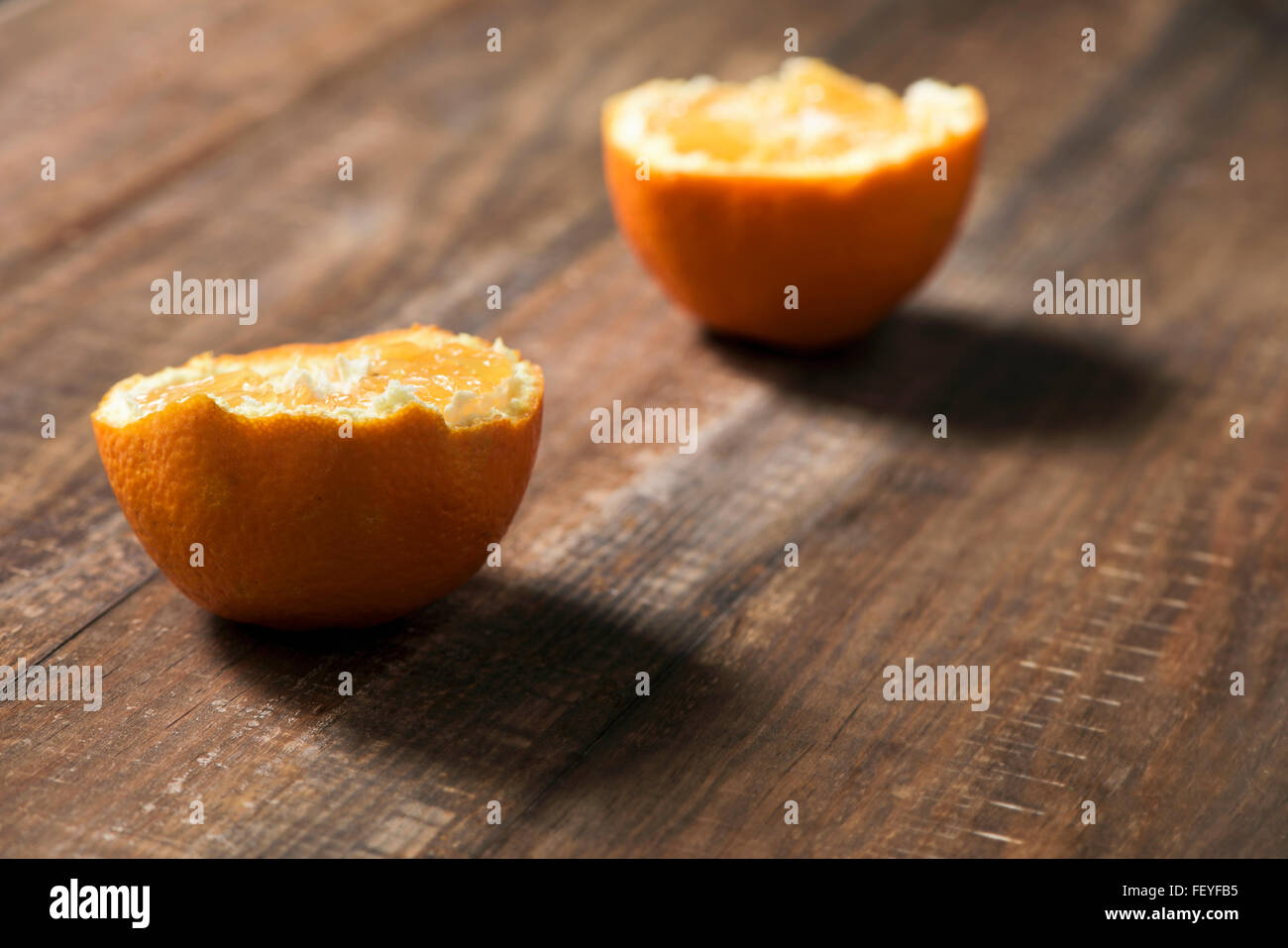 Orange fruit cut in half hi-res stock photography and images - Alamy