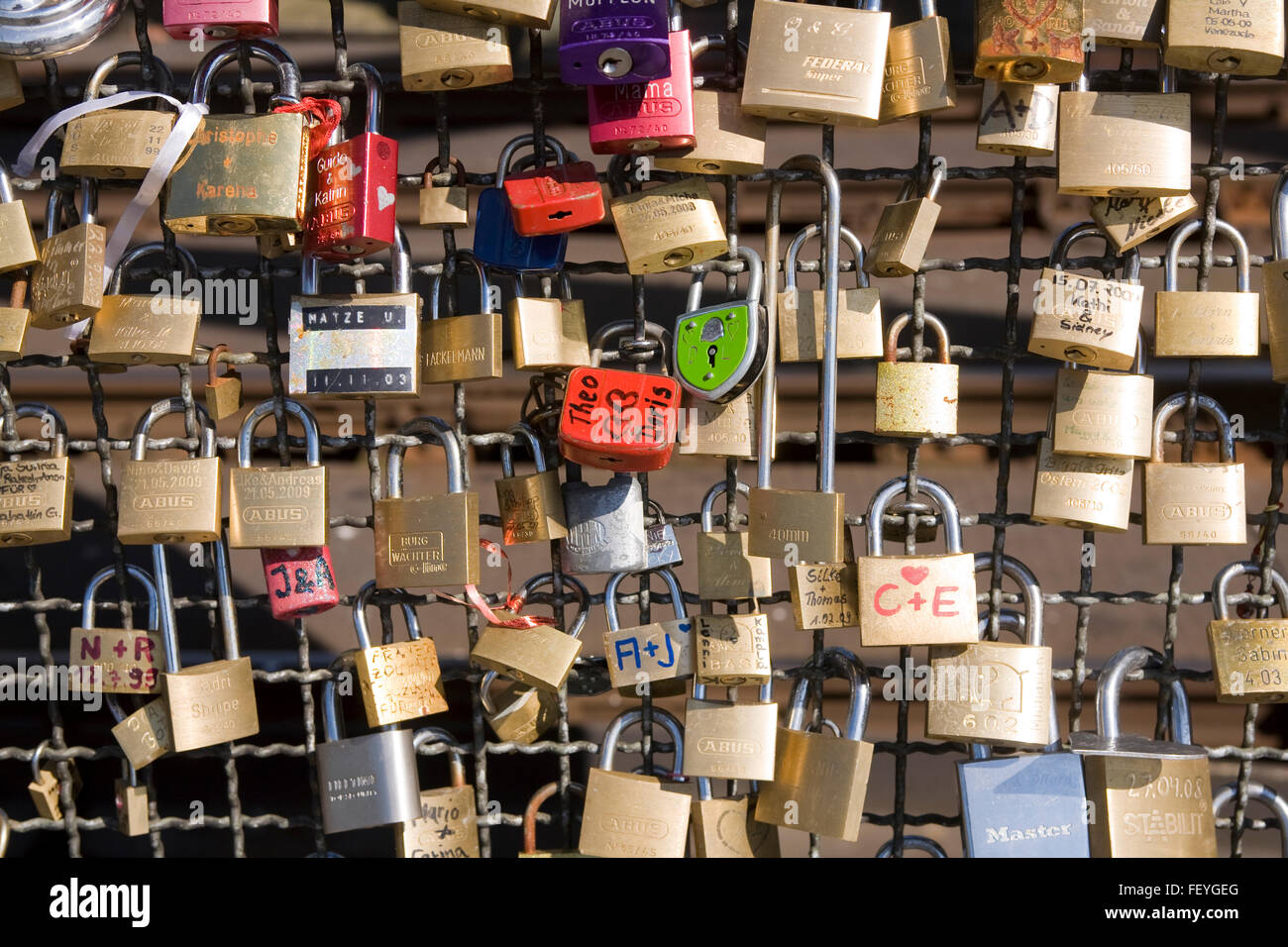 Europe, Germany, Cologne, padlocks on fence of footpath of the ...