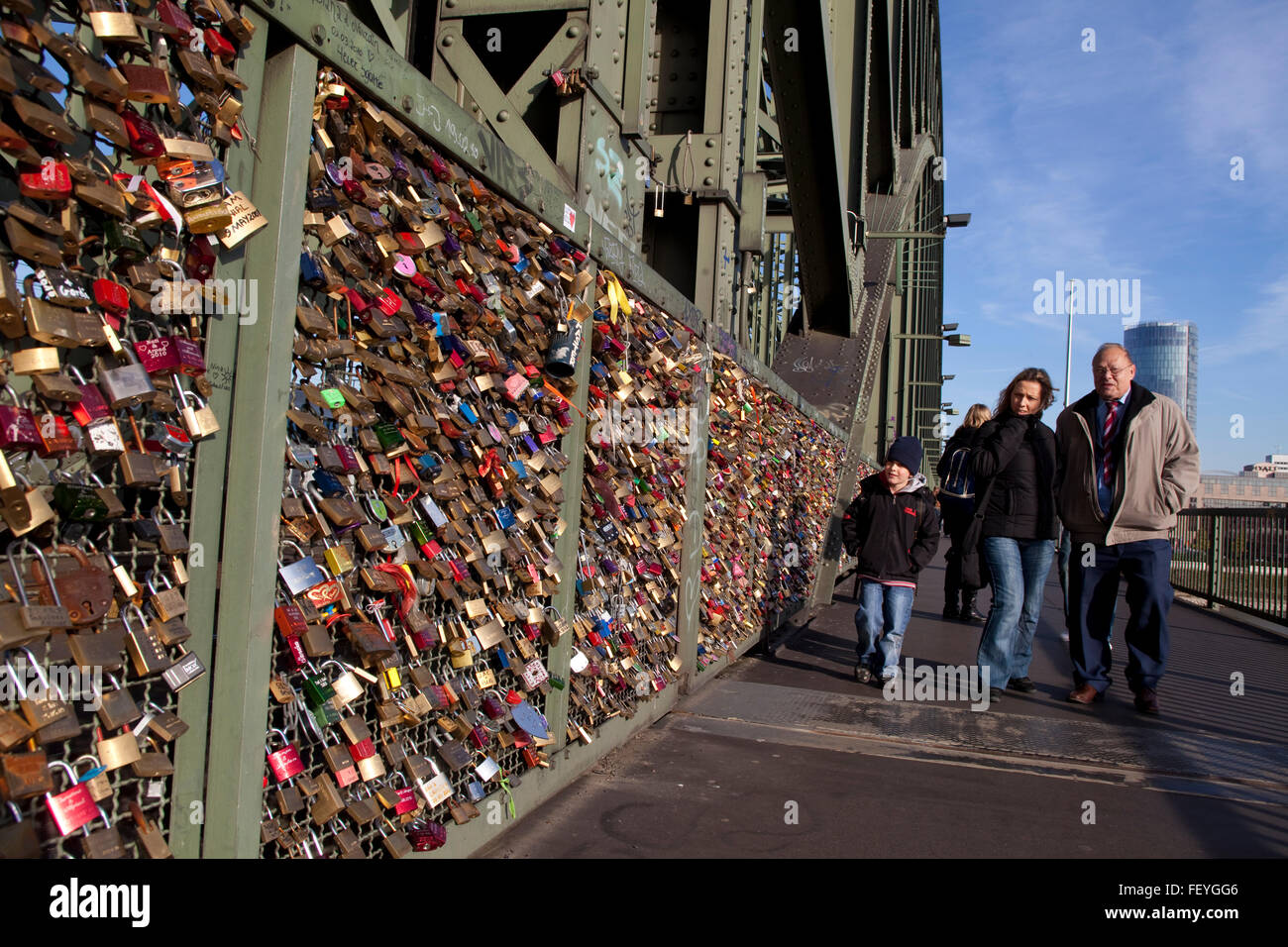 Europe, Germany, Cologne, padlocks on fence of footpath of the ...