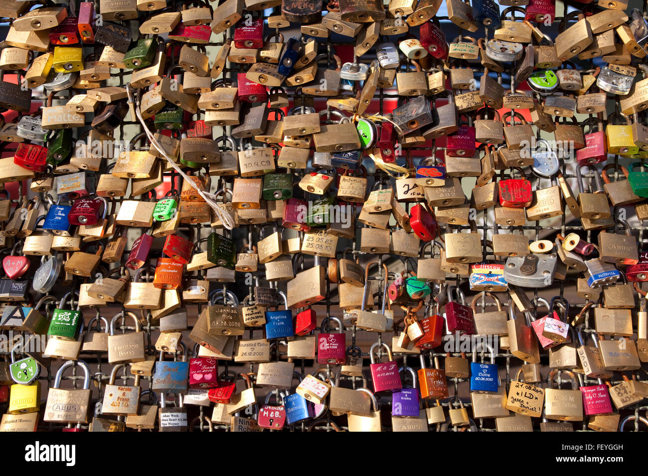 Europe, Germany, Cologne, padlocks on fence of footpath of the ...