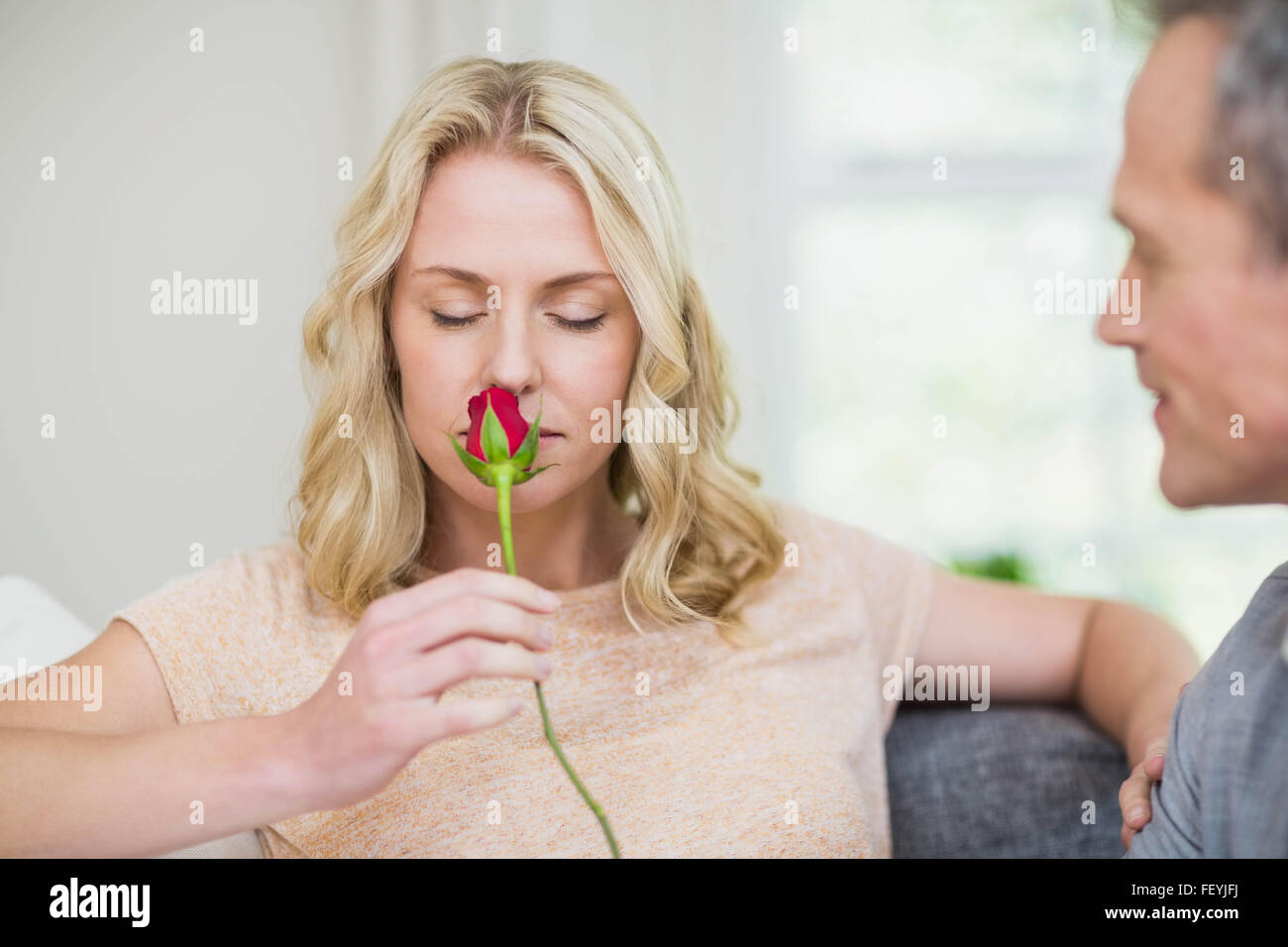 Smelling rose woman hi-res stock photography and images - Alamy
