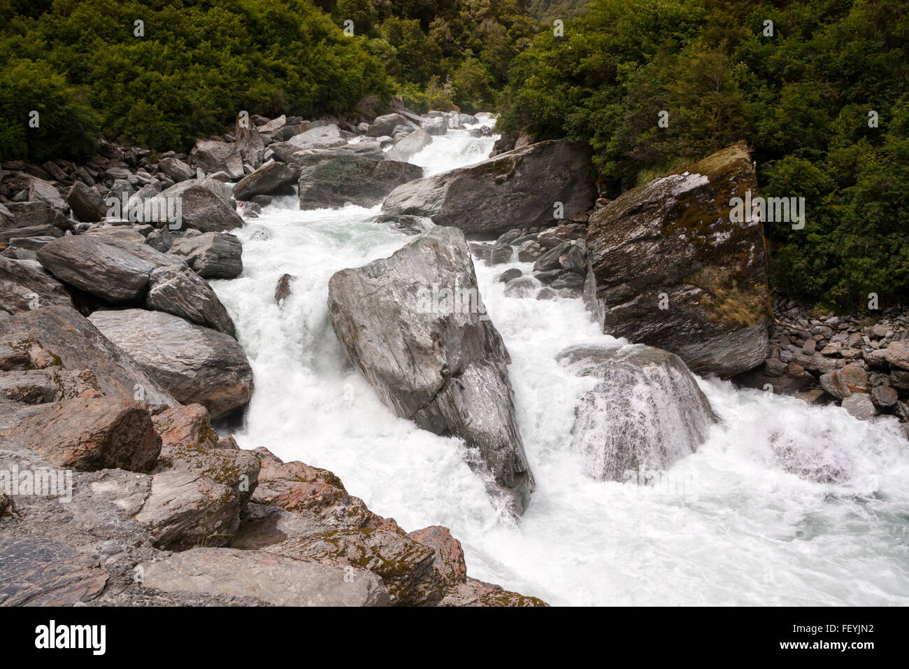 Colorful Rocks in White Water - New Zealand, Mt Aspiring National Park ...