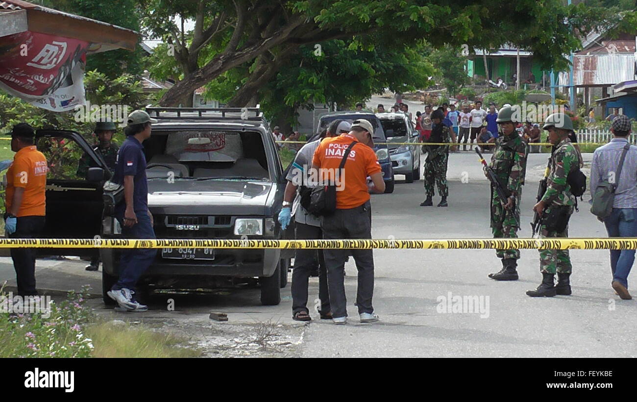 Poso, Indonesia. 09th Feb, 2016. Members of Brimob police surround the ...