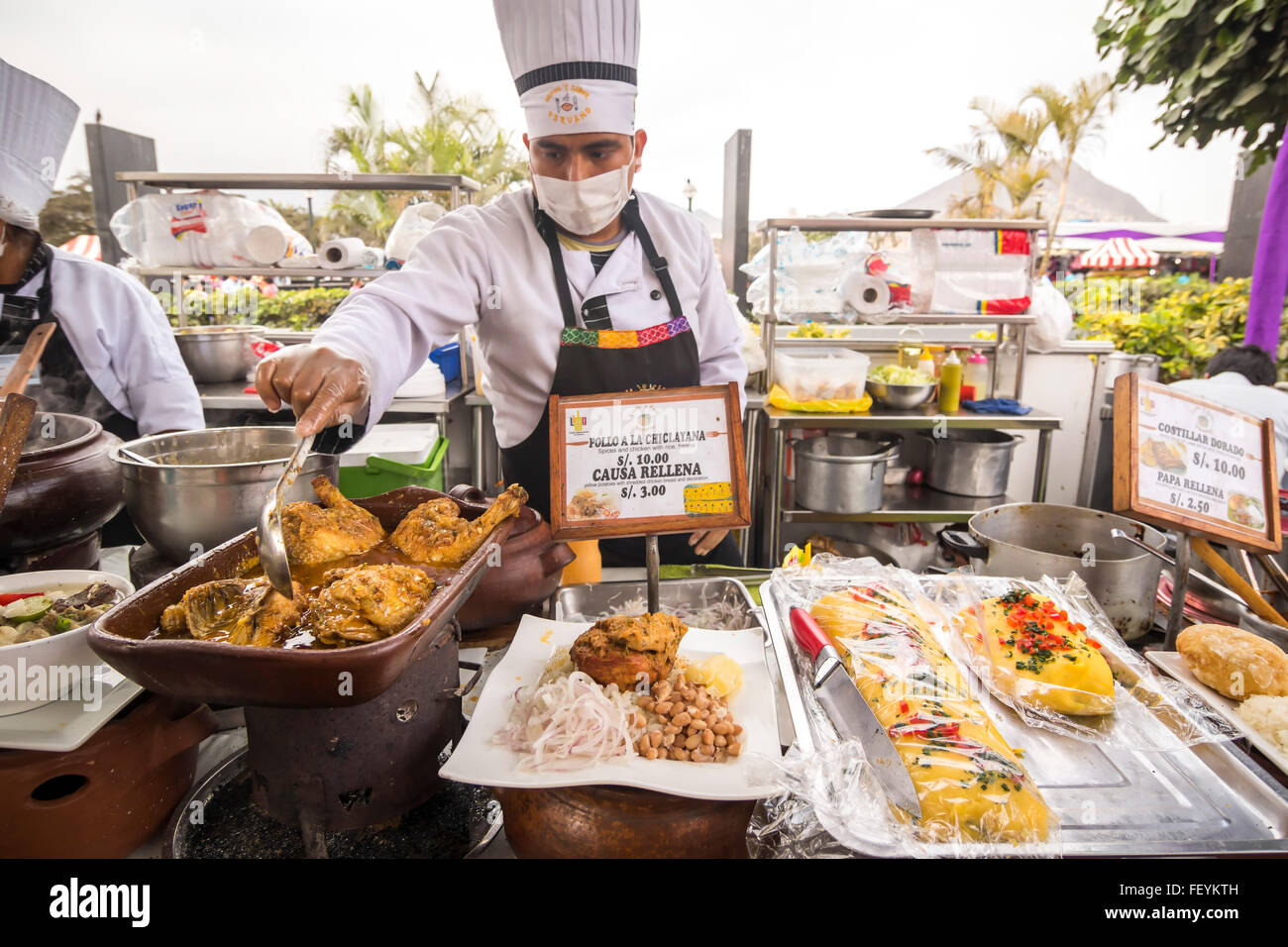 Chef cooking chicken. Peruvian food dishes: "Pollo a la Chiclayana ...