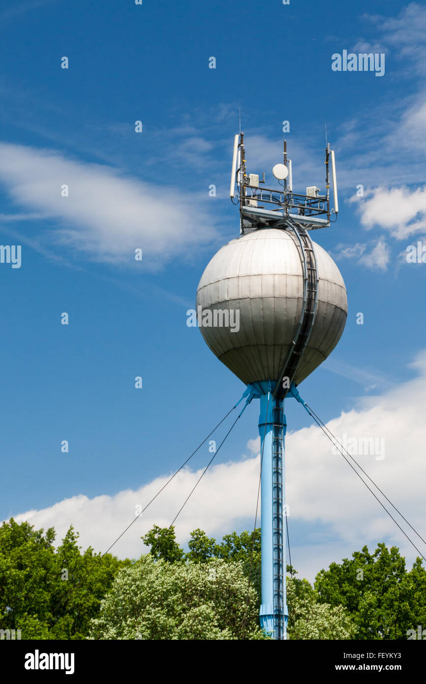Modern Water Tower with Telecommunication Antennas, blue sky Stock ...