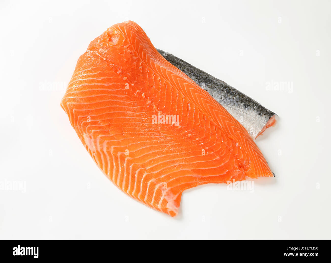 raw salmon fillet with silver skin on white background Stock Photo - Alamy