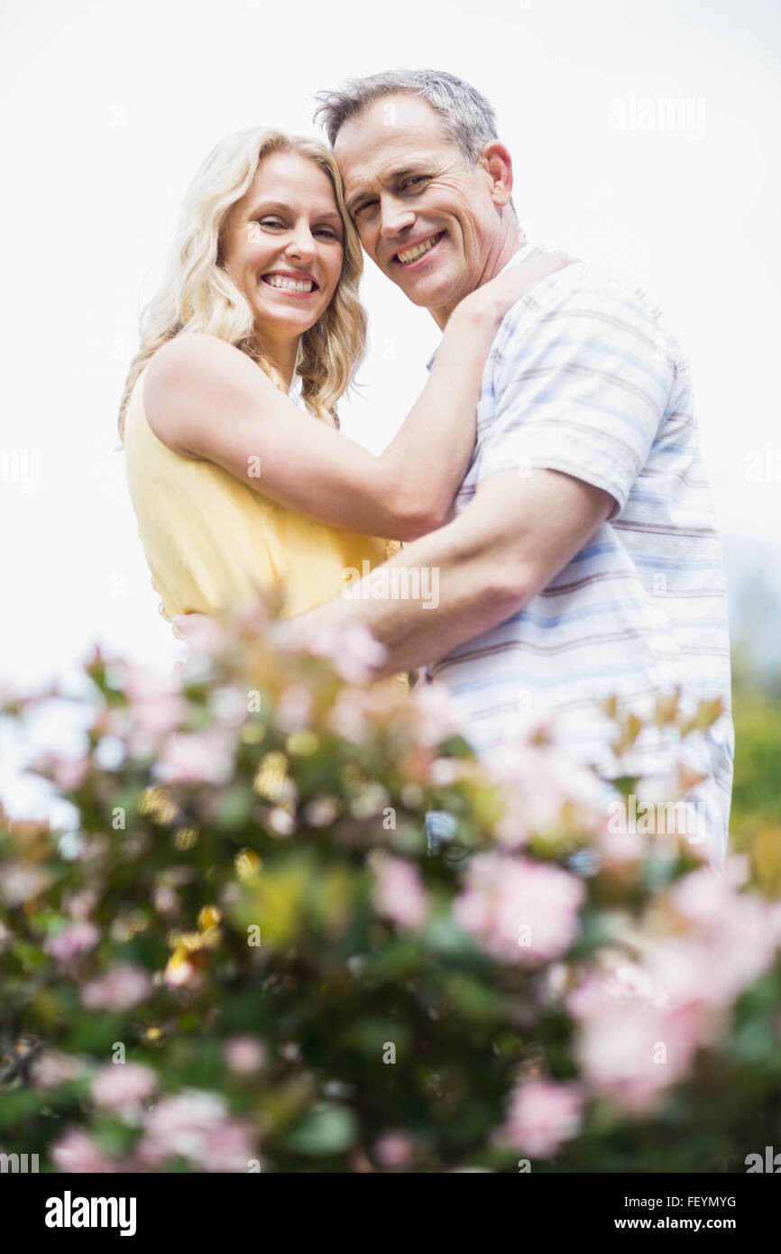 Happy couple hugging Stock Photo - Alamy