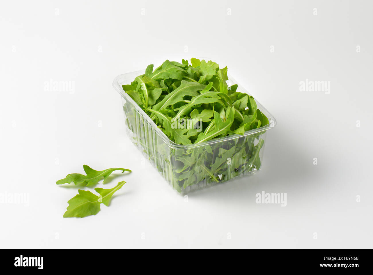 package of fresh arugula leaves Stock Photo - Alamy