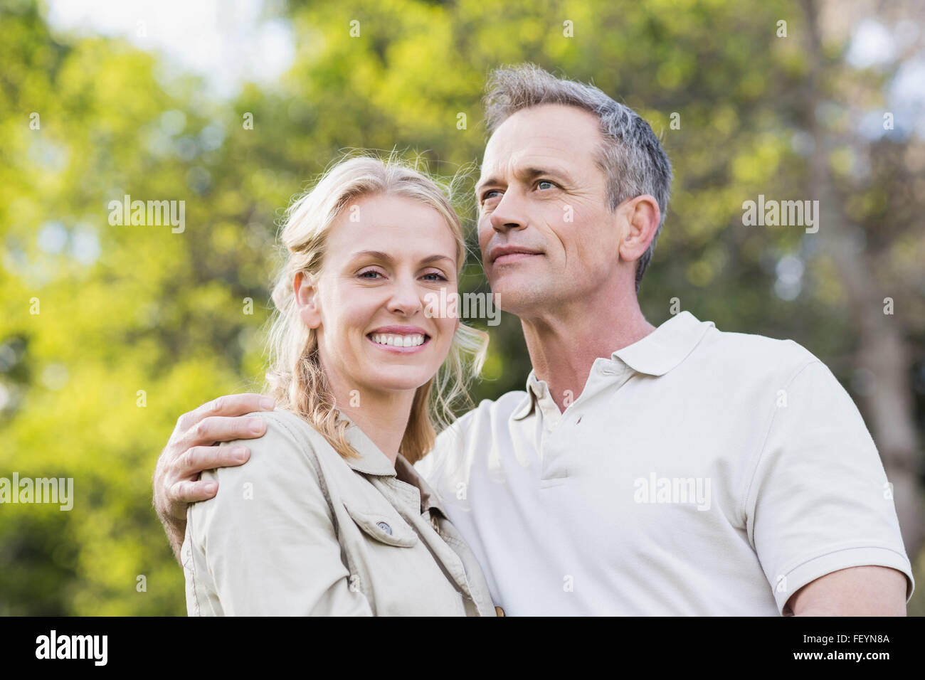 Holding arms around each other hi-res stock photography and images - Alamy