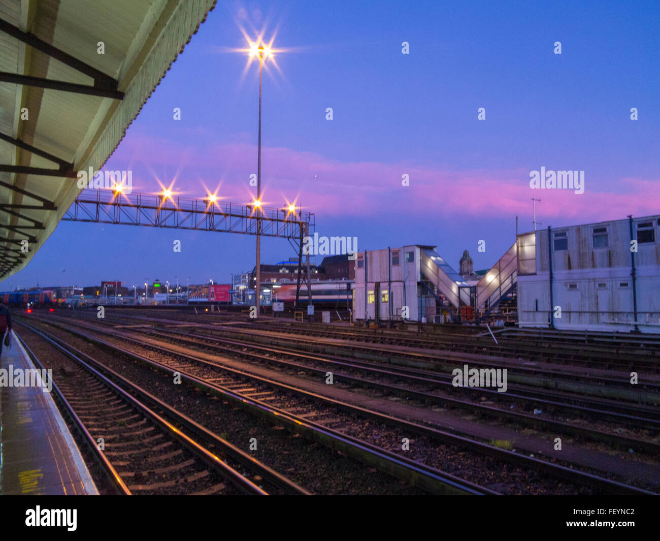 A winter sunset at Clapham Junction station with South Western West ...
