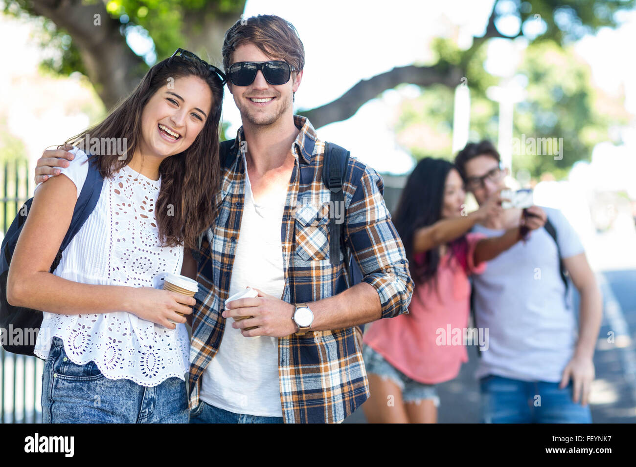 Hip couple posing for camera Stock Photo - Alamy