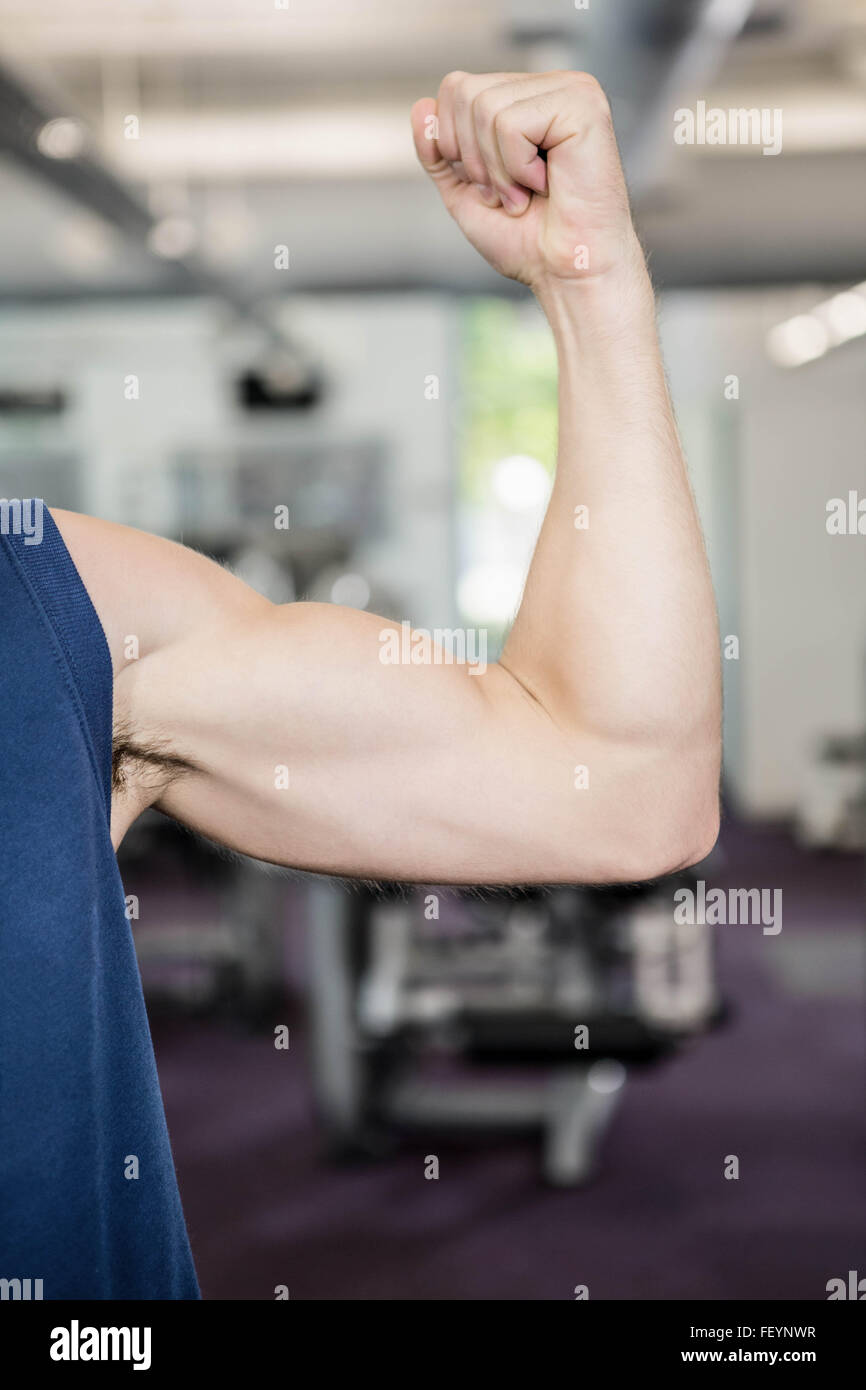 Close up of man showing biceps Stock Photo - Alamy